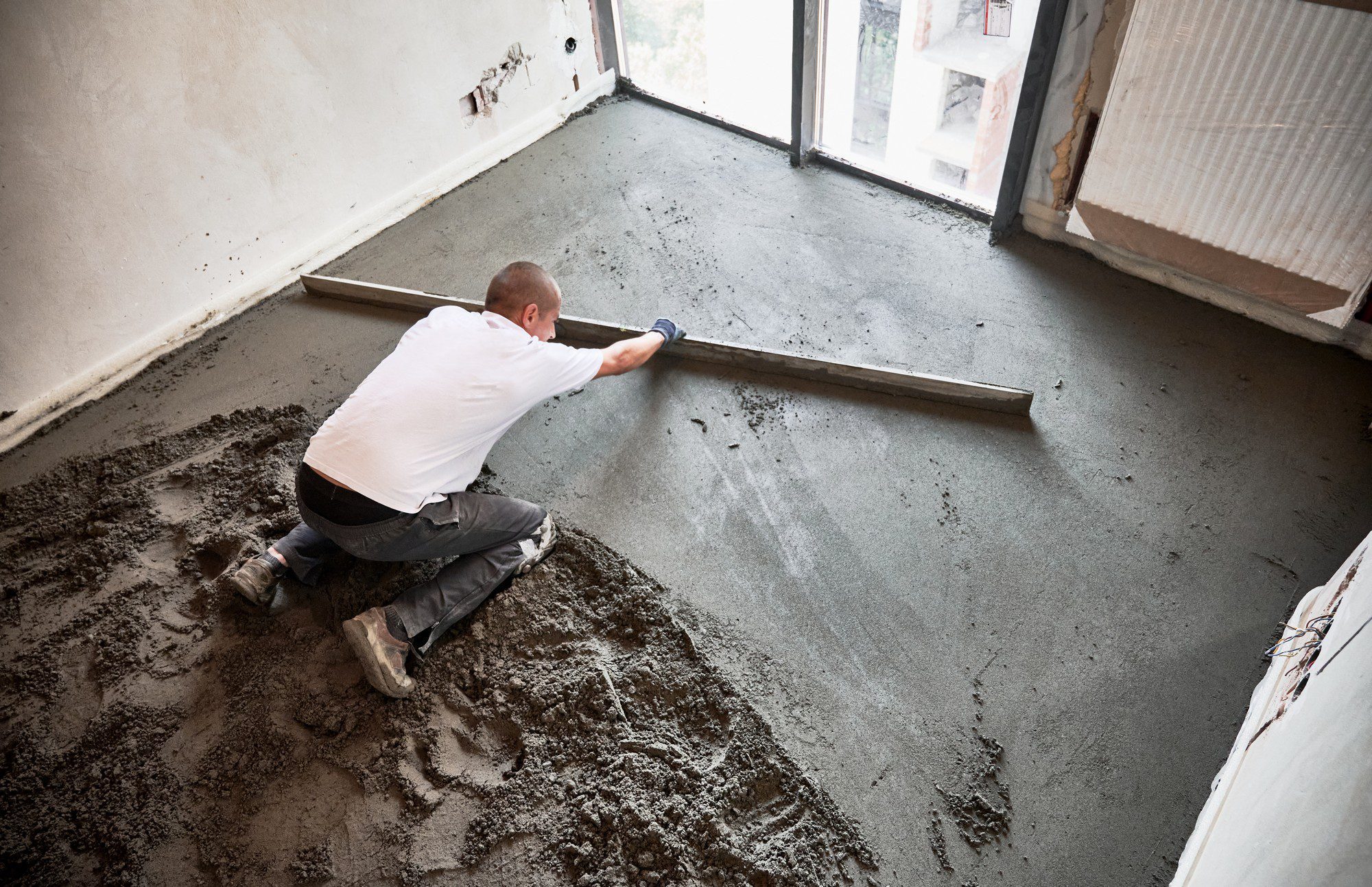 Experience the Efficiency of Liquid Screed | John Stanley Plastering